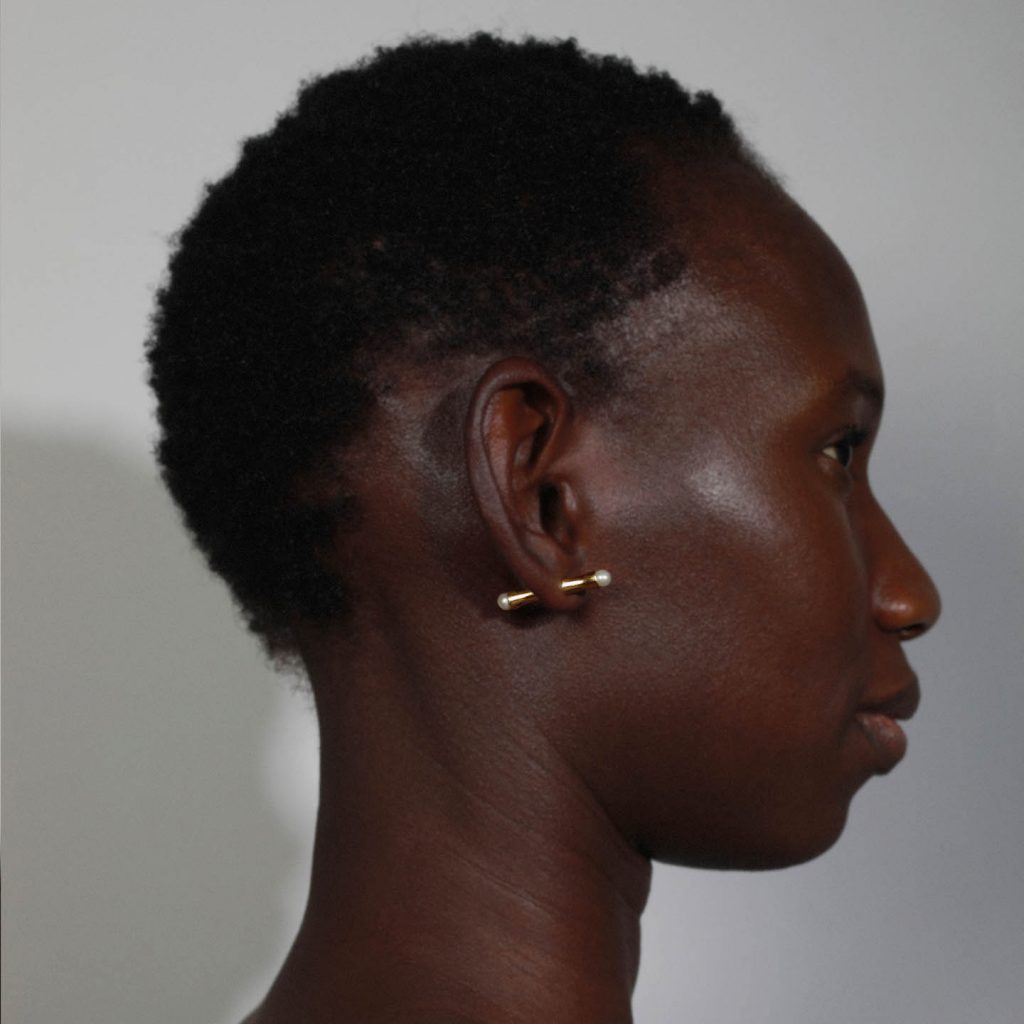 Two-sided white earring