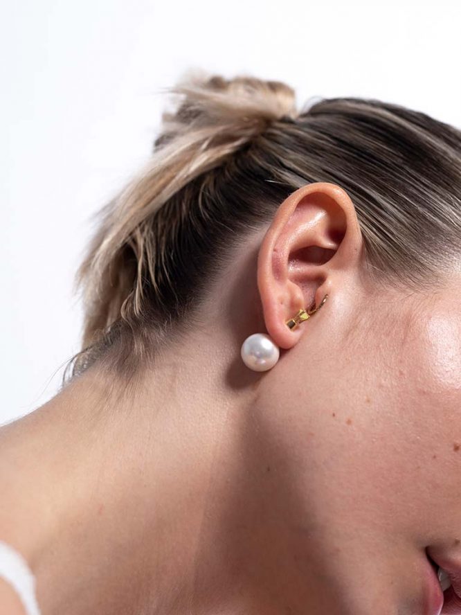 Pearl and Parrot Jade piercing